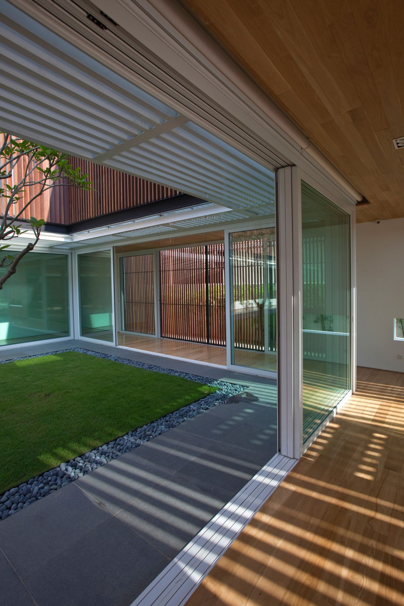 Enclosed Open House in Singapore by Wallflower Architecture + Design