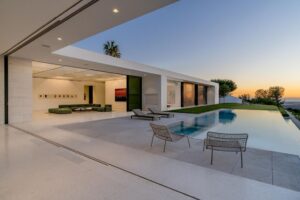 Prominent Sky House with Grassy Knoll Surrounded by XTEN Architecture