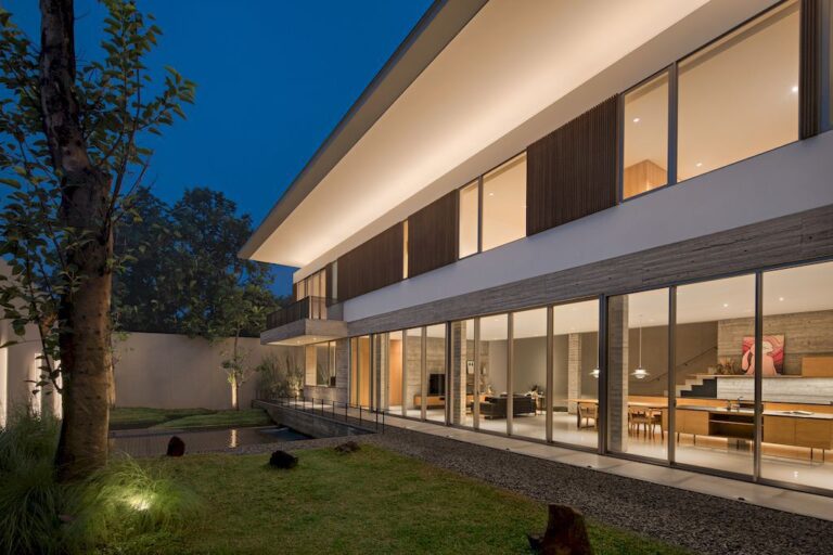 Hover House with rustic & brutal of concrete Design by Pranala Associates