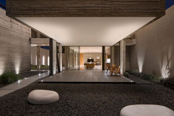 Hover House with rustic & brutal of concrete Design by Pranala Associates