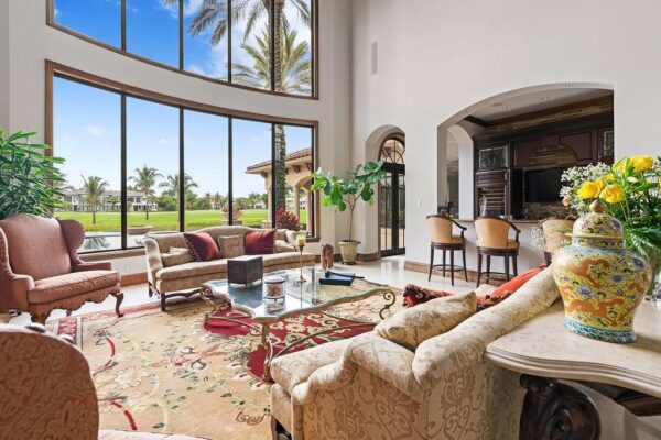 This Custom Home in Boca Raton with An Oversized Infinity Pool and ...