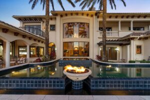 This Custom Home in Boca Raton with An Oversized Infinity Pool and ...