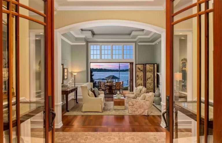 Exuding a Sense of Oneness with the Lake, This Gated Ben Leland Estate ...