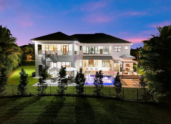 A Beautiful 8,000 SF Home on A Lush Private Lakefront Lot in Delray Beach