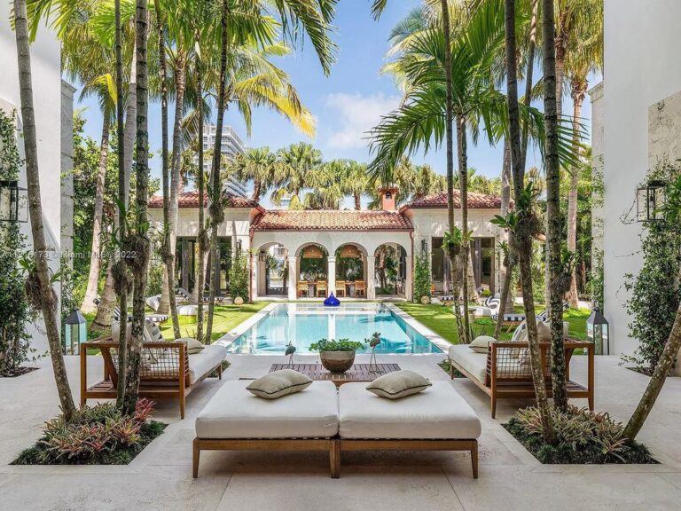 An Elegant Villa in Miami Beach Featuring an Overflowing Perimeter Pool ...