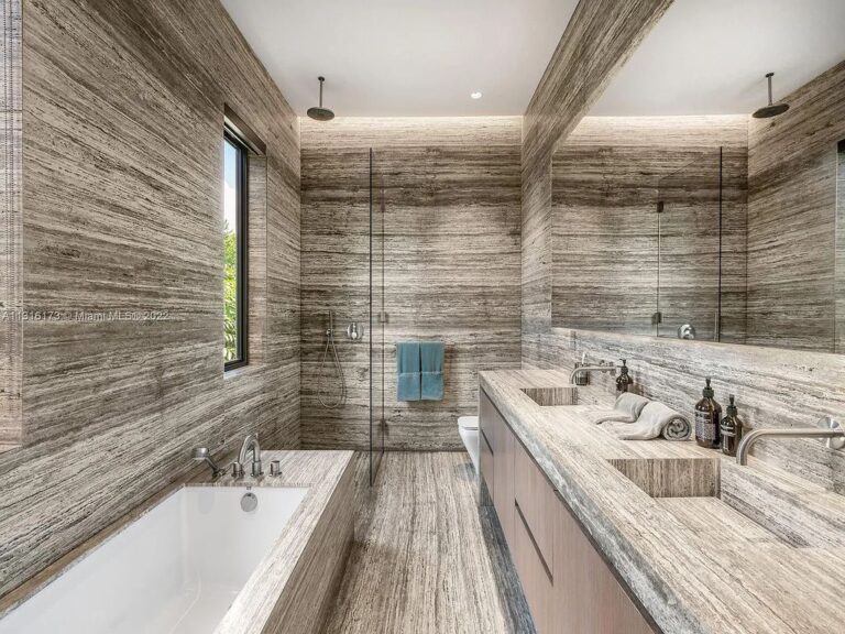 An Elegant Villa in Miami Beach Featuring an Overflowing Perimeter Pool ...