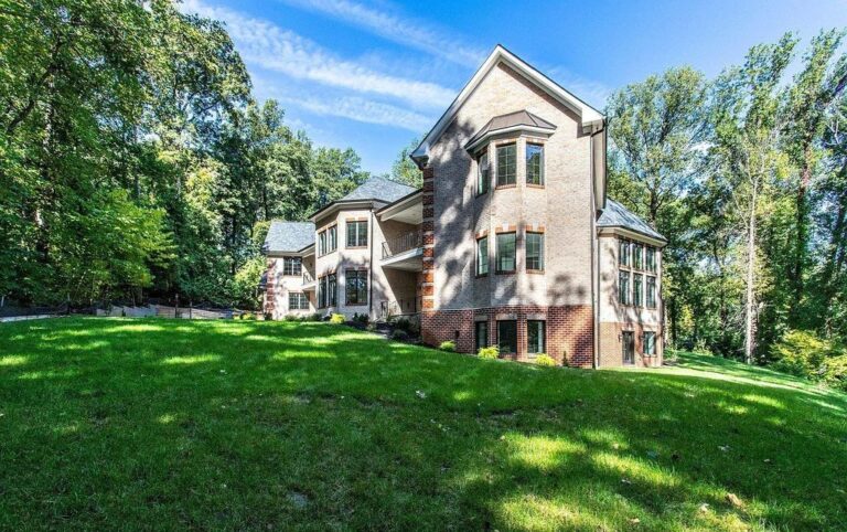 Featuring a Two-Toned Brick Exterior With Stone Veneer Accents, This ...