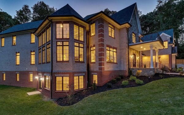 Featuring a Two-Toned Brick Exterior With Stone Veneer Accents, This ...
