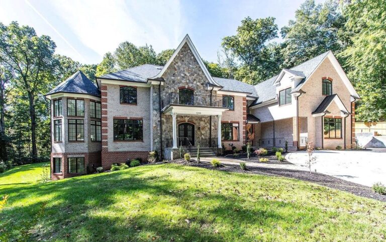 Featuring a Two-Toned Brick Exterior With Stone Veneer Accents, This ...