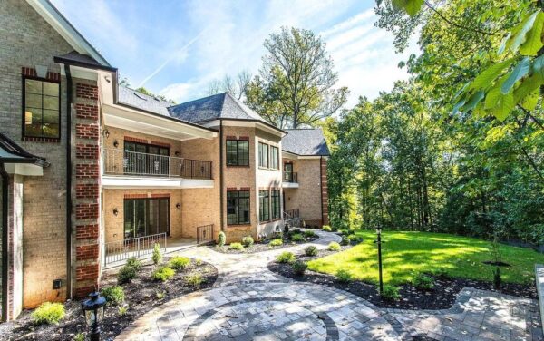 Featuring a Two-Toned Brick Exterior With Stone Veneer Accents, This ...