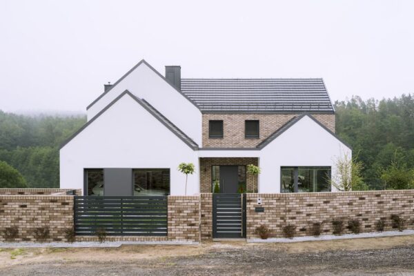 Multi Gable House with Picturesque Views of Forest in Brazil by bkm group