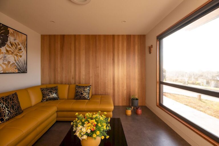 The char house inspired by fallen burnt tree branch by Starbox architecture