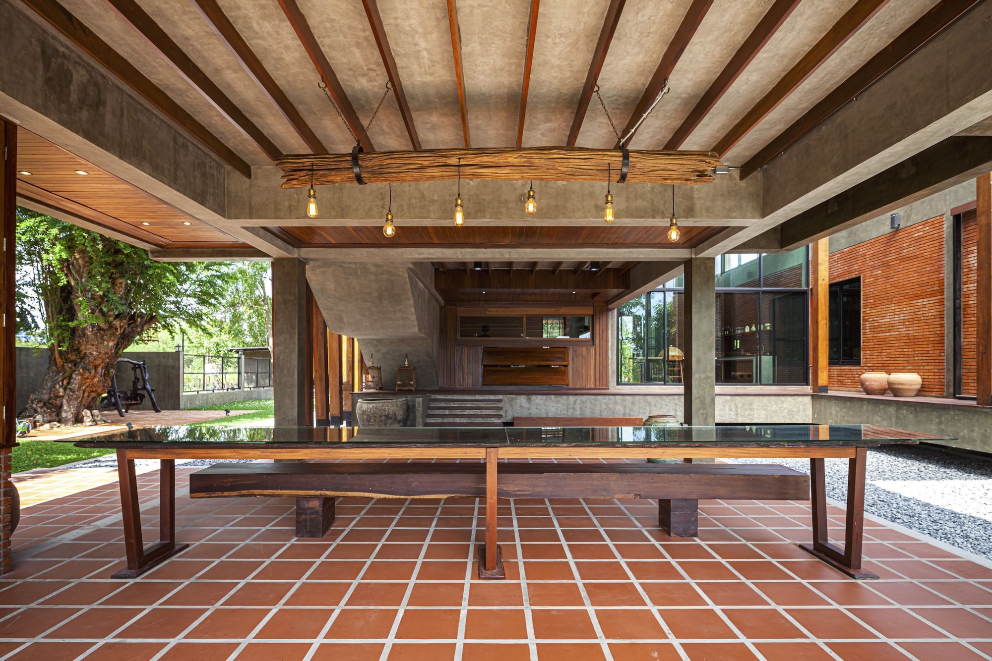 BULBUL House with Living Space Extension by Volume Matrix Studio