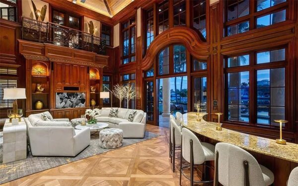 Palatial Palm Beac Inspired Mansion with 665 Feet of Wrap-Around Water ...