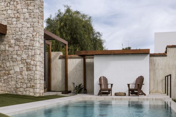 Casa R Created from two Parallel Stone Walls by Ascoz Arquitectura