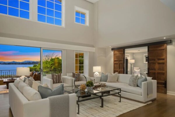 Explore the Charm and Luxury of this Exquisite West-Facing Waterfront ...