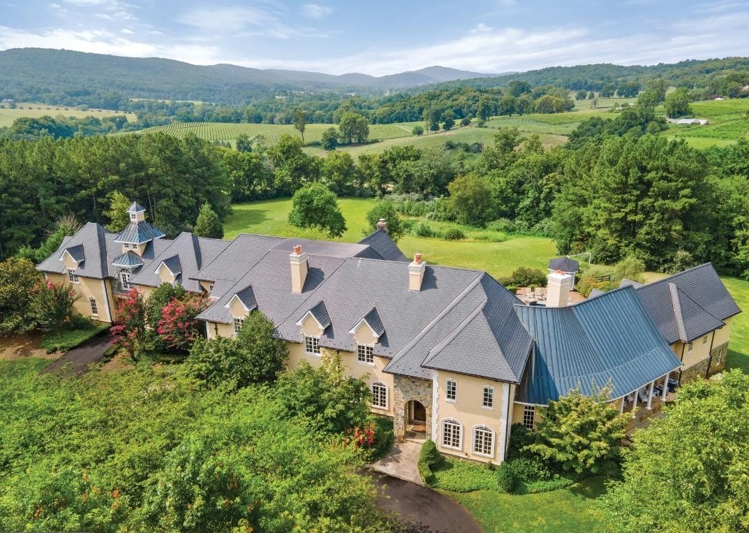 Stucco and Stone Estate on 30 Acres of Manicured Lawns and Woodlands in ...