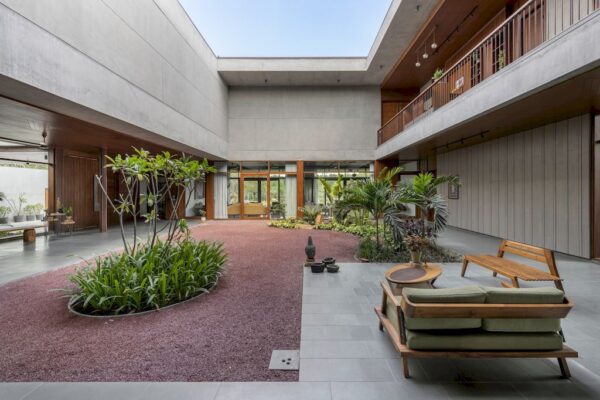 The Monolithic House Features Open & Green Spaces by MODO Designs