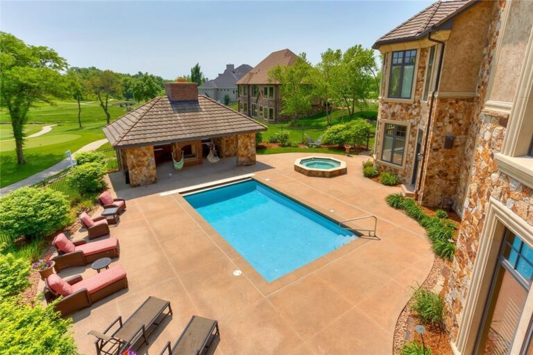 Luxurious Living Redefined: Timeless Elegance in Iowa's Stucco and ...