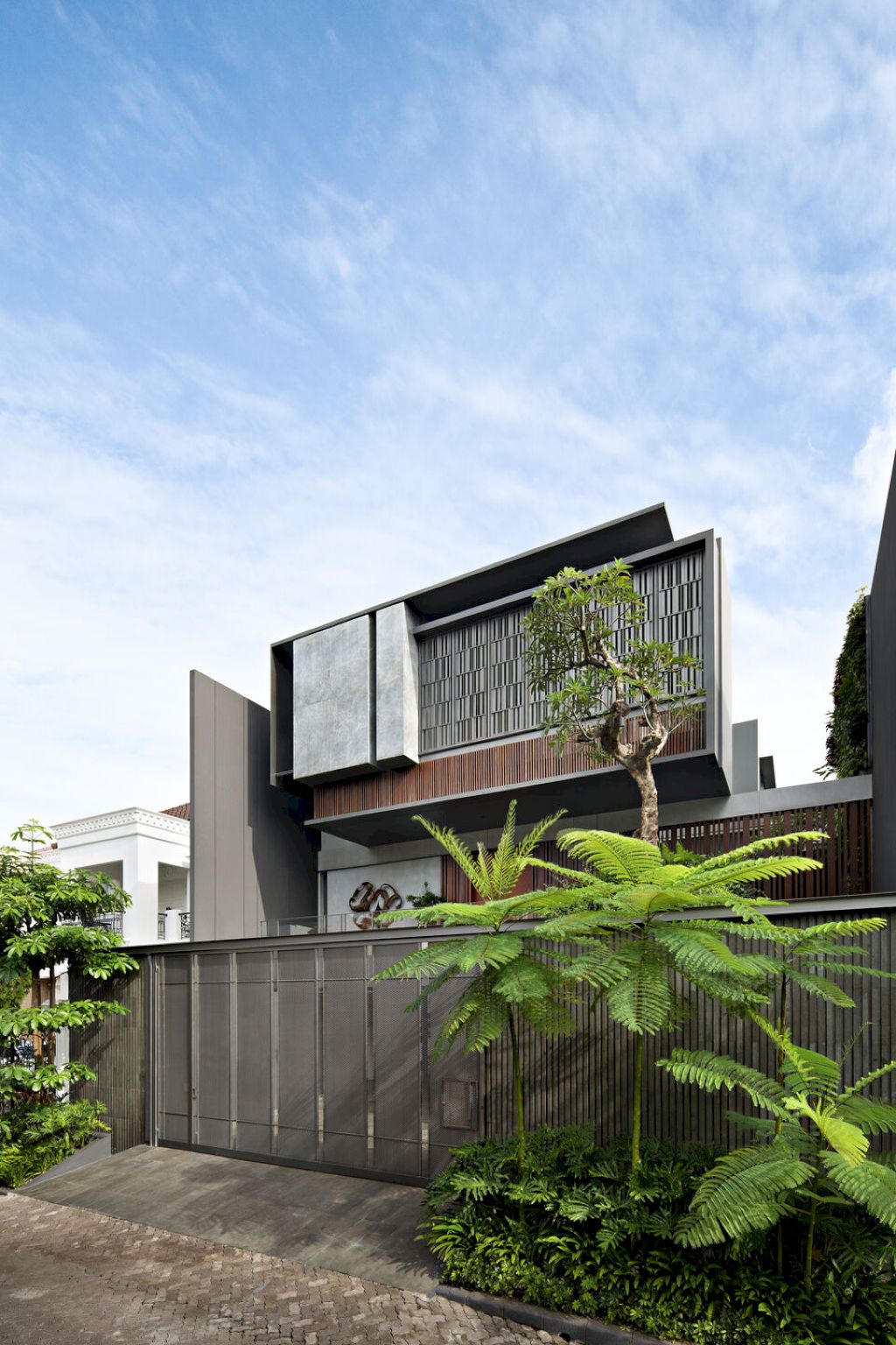 ES Residence, a Modern Tropical Haven by Axial Studio